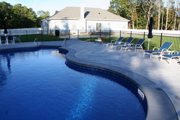 Stamped Concrete Pool Patio by Sanstone Creations